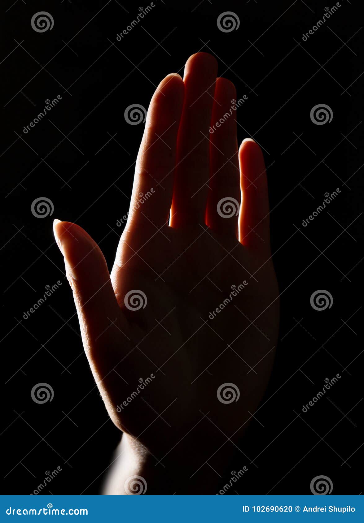 Hand on a black background stock photo. Image of sign - 102690620