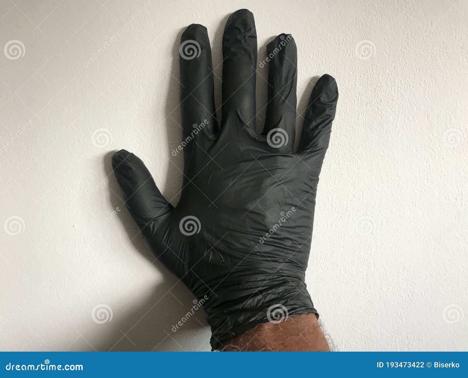 Hand in black glove stock photo. Image of black, protective - 193473422
