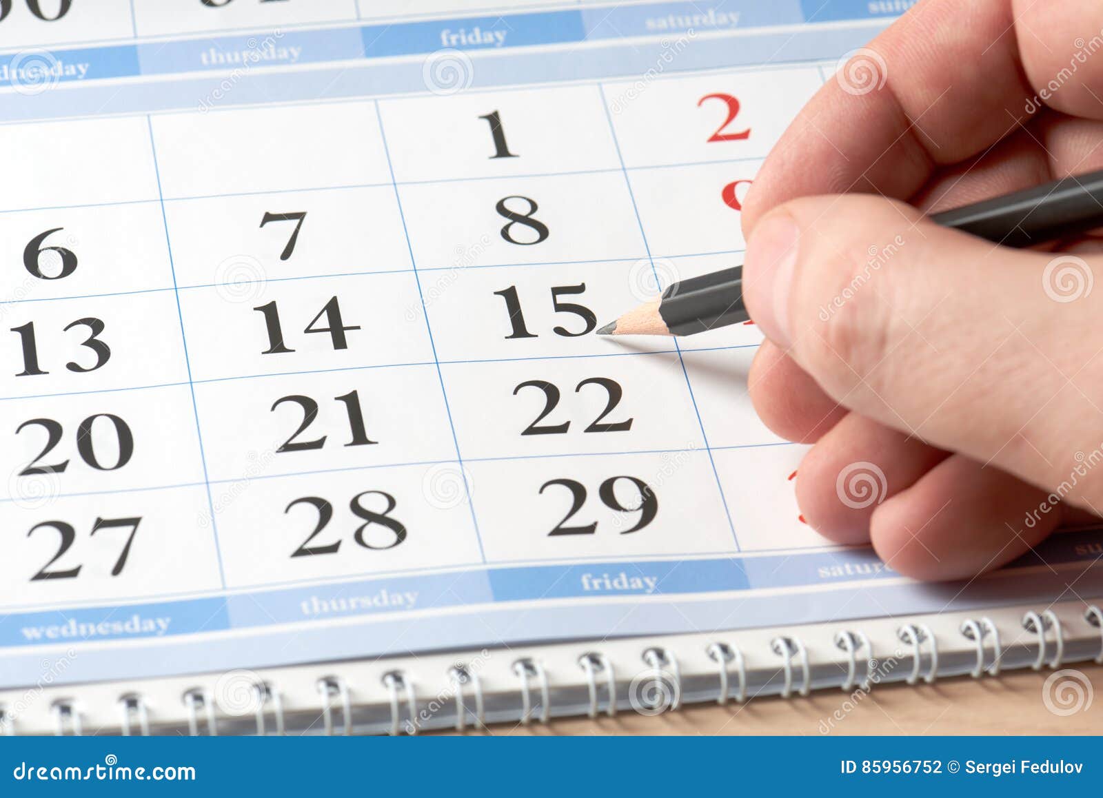 Hand with Black Pencil on Calendar Stock Photo - Image of deadline ...