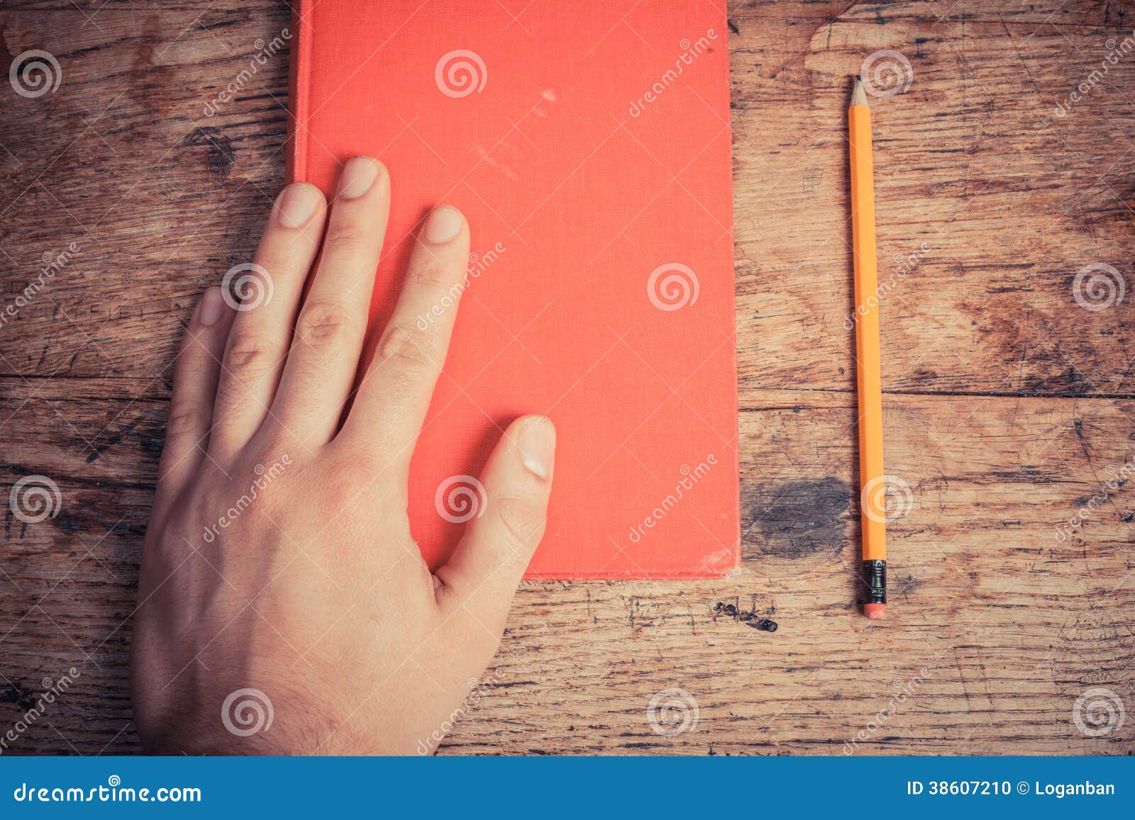 Hand with book and pencil stock photo. Image of high - 38607210