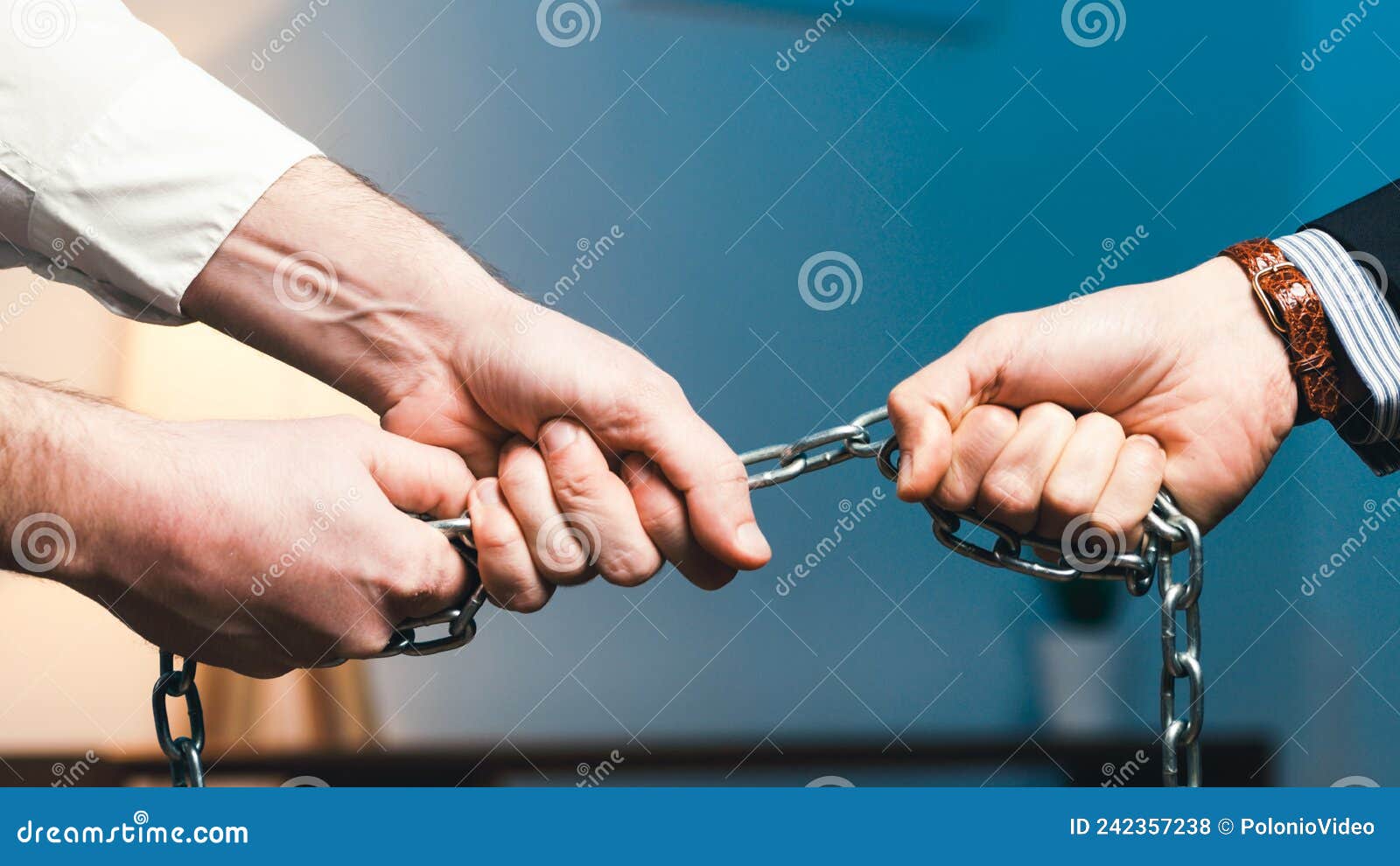 Hand of the Boss in the Office Pulls an Employee with a Chain Stock ...