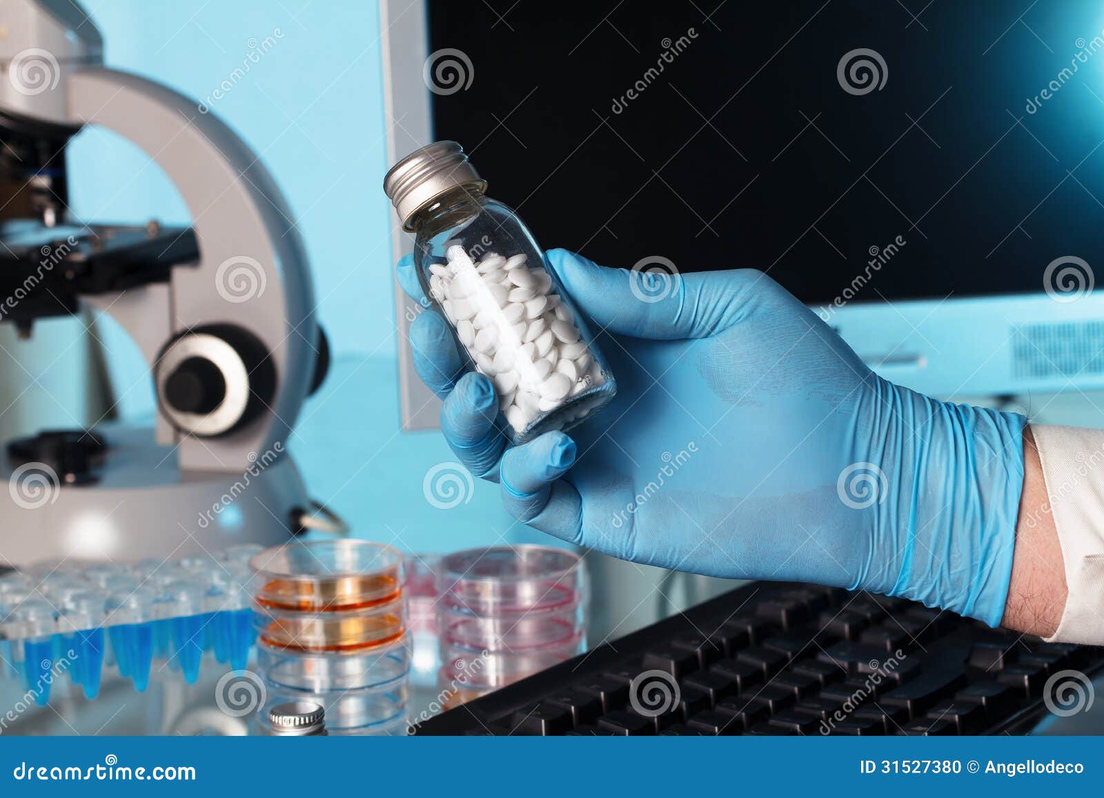 Hand with a Bottle of Pills Stock Photo - Image of laboratory, computer ...