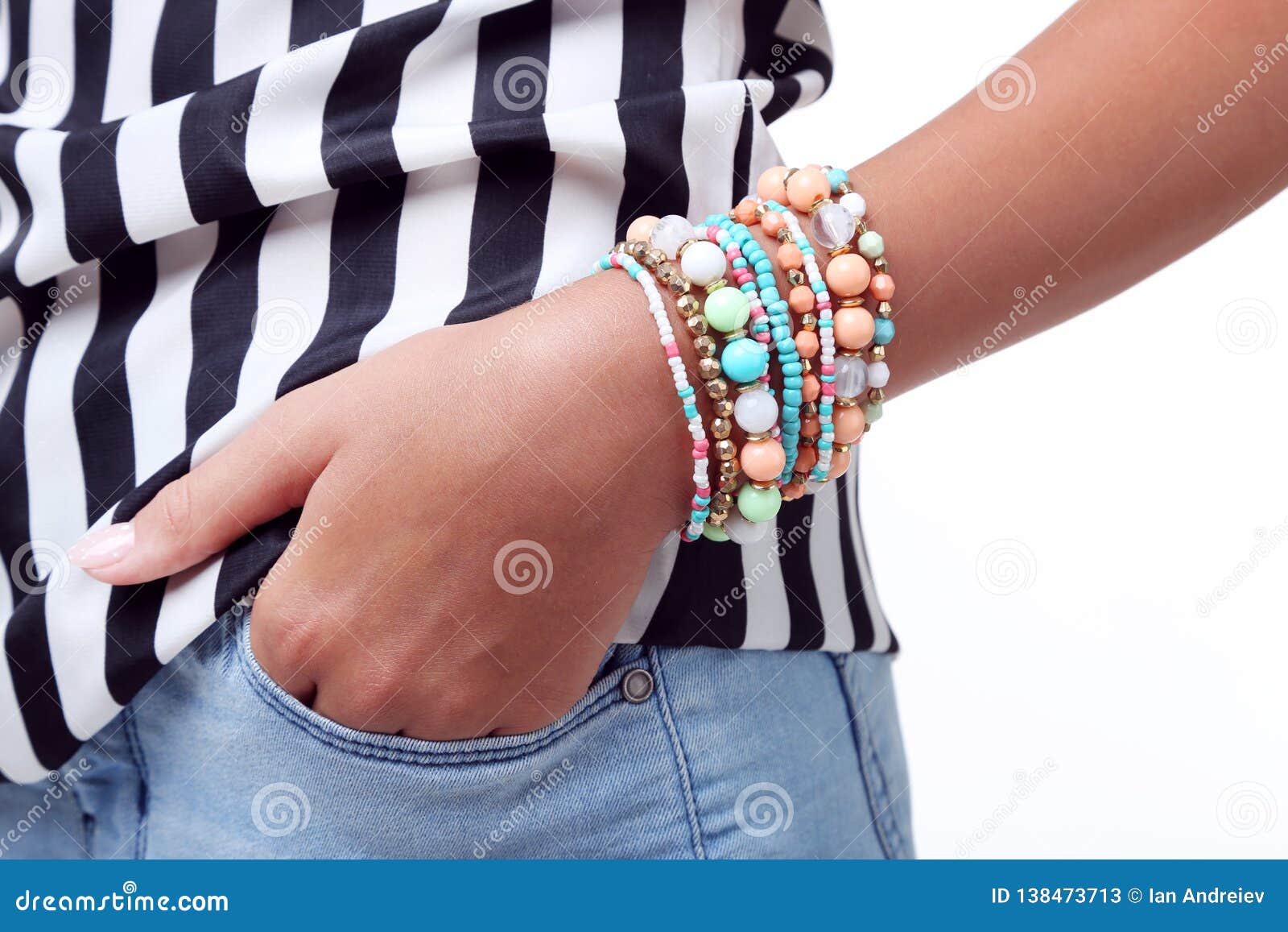 Hand with bracelets stock image. Image of denim, beautiful - 138473713