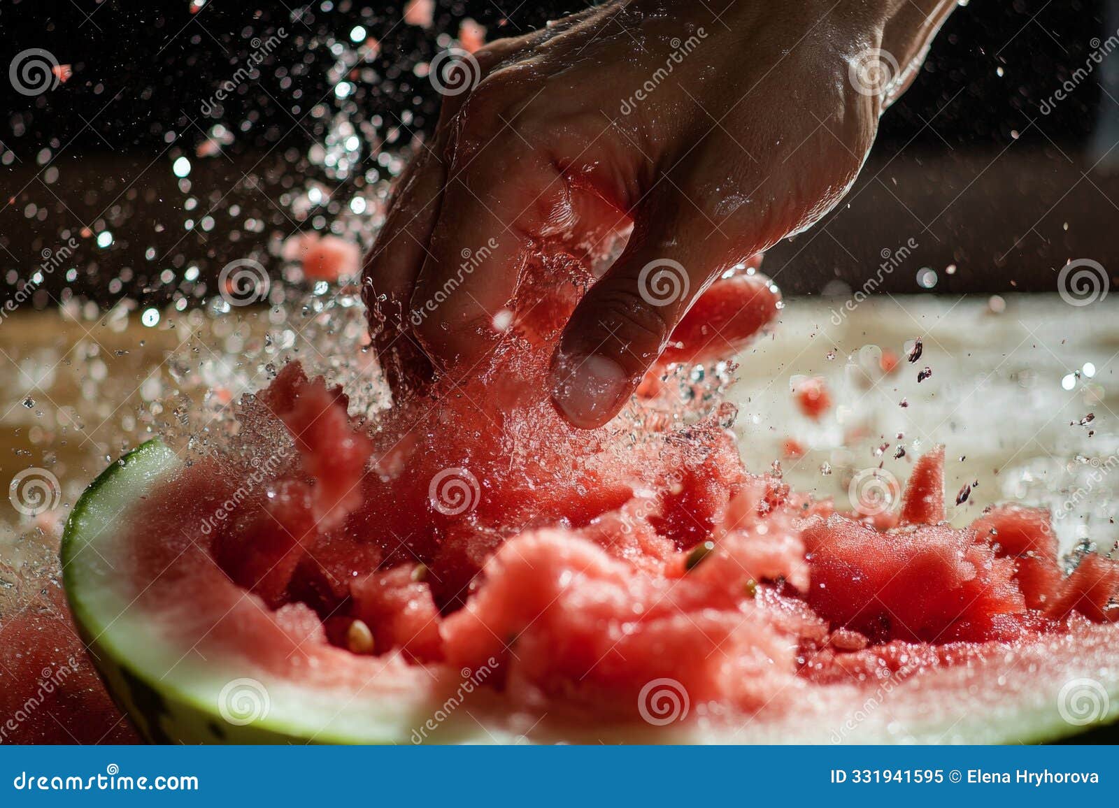 Hand Breaking a Watermelon Causing a Dramatic Burst of Pulp and Seeds ...