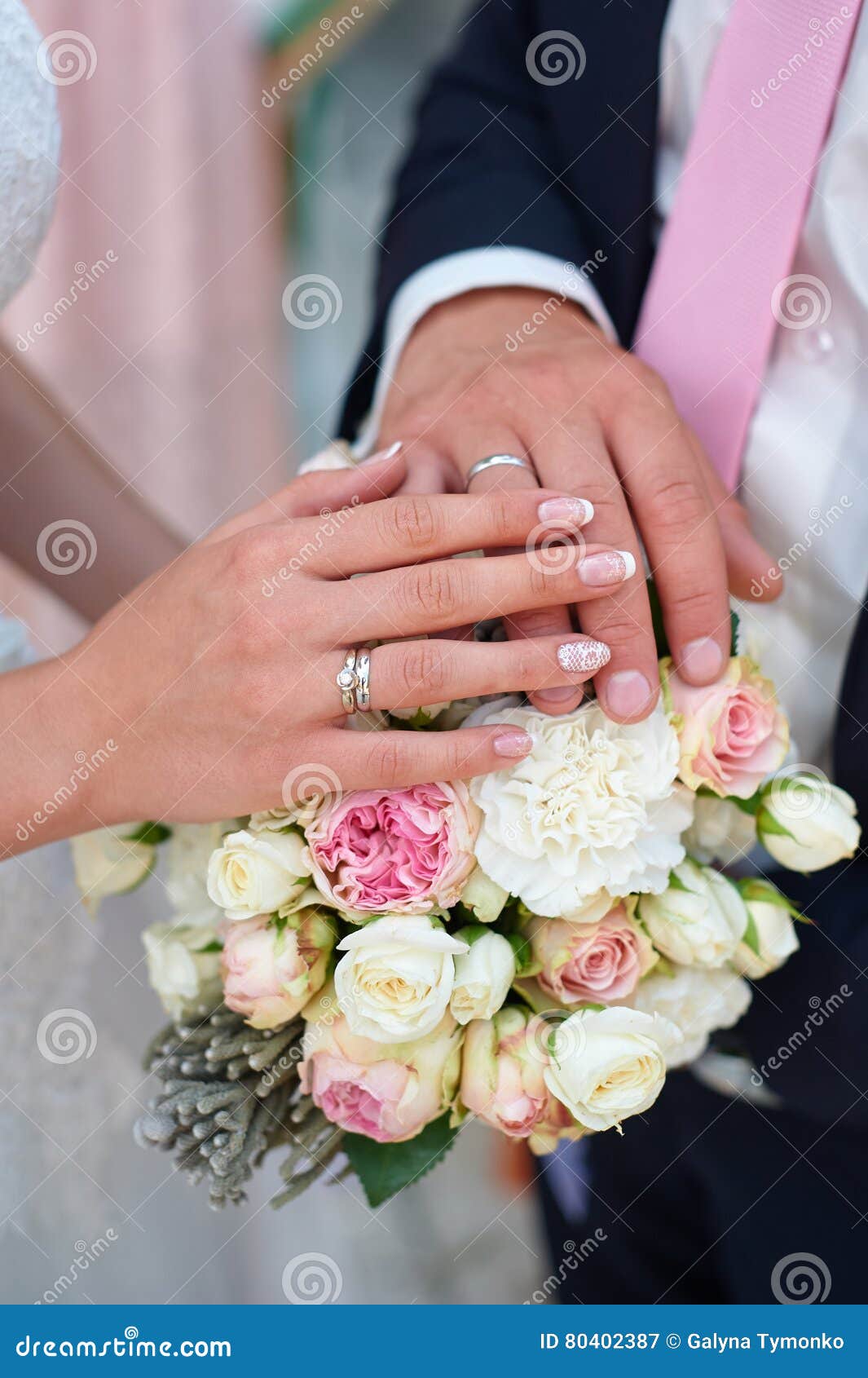Hand of the Bride and Groom with Rings for Wedding Bouquet Stock Image ...