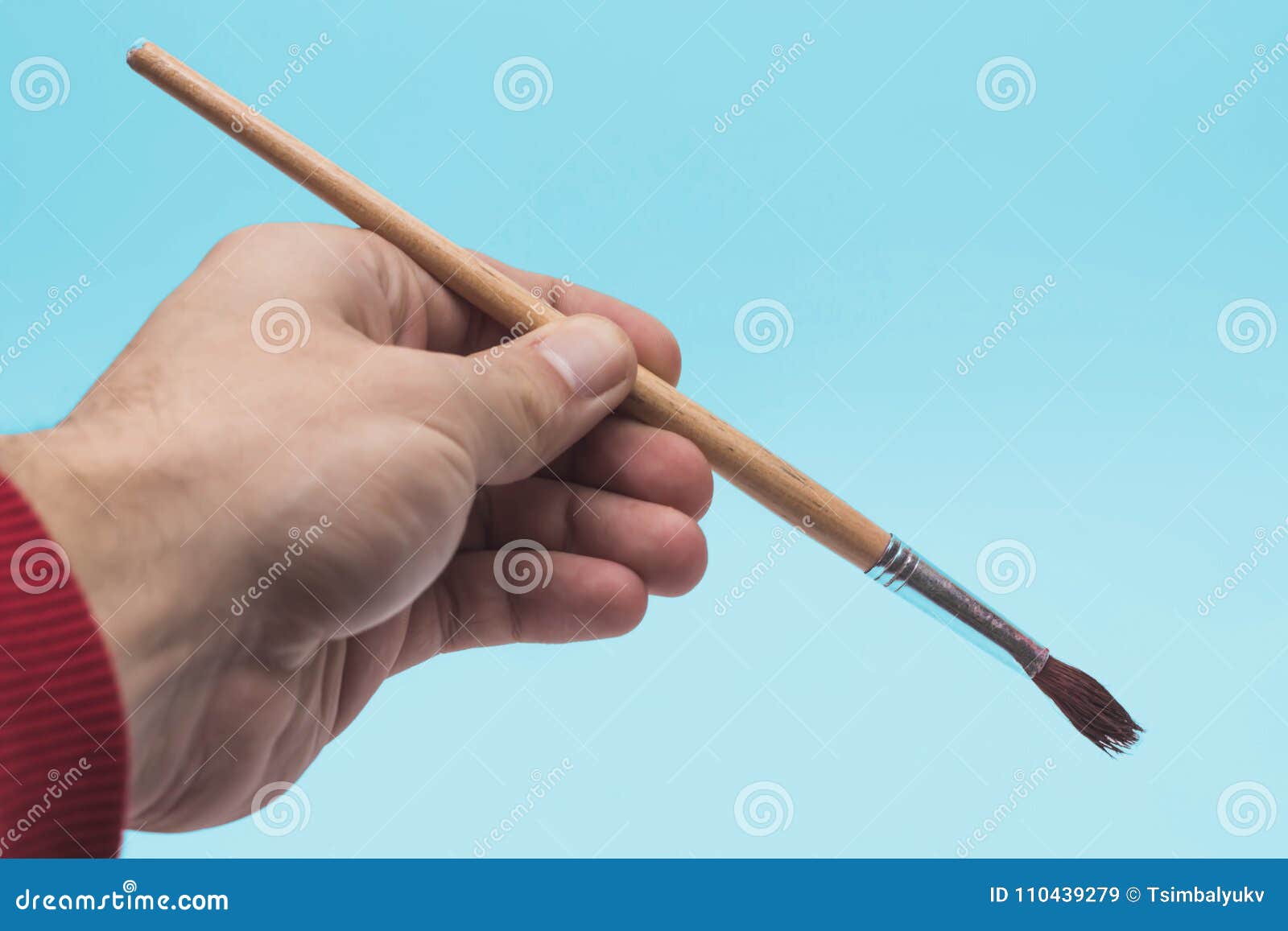 Hand with brush and paint stock image. Image of creativity - 110439279