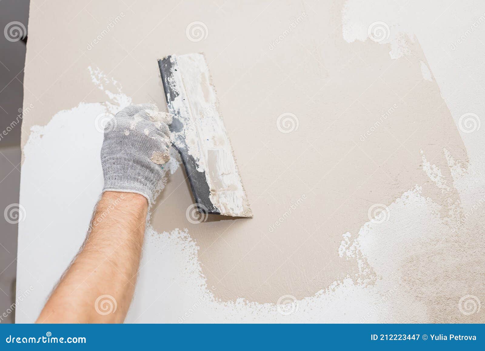Hand of Builder Worker Plastering at Wall.Renovation Workers Hand ...