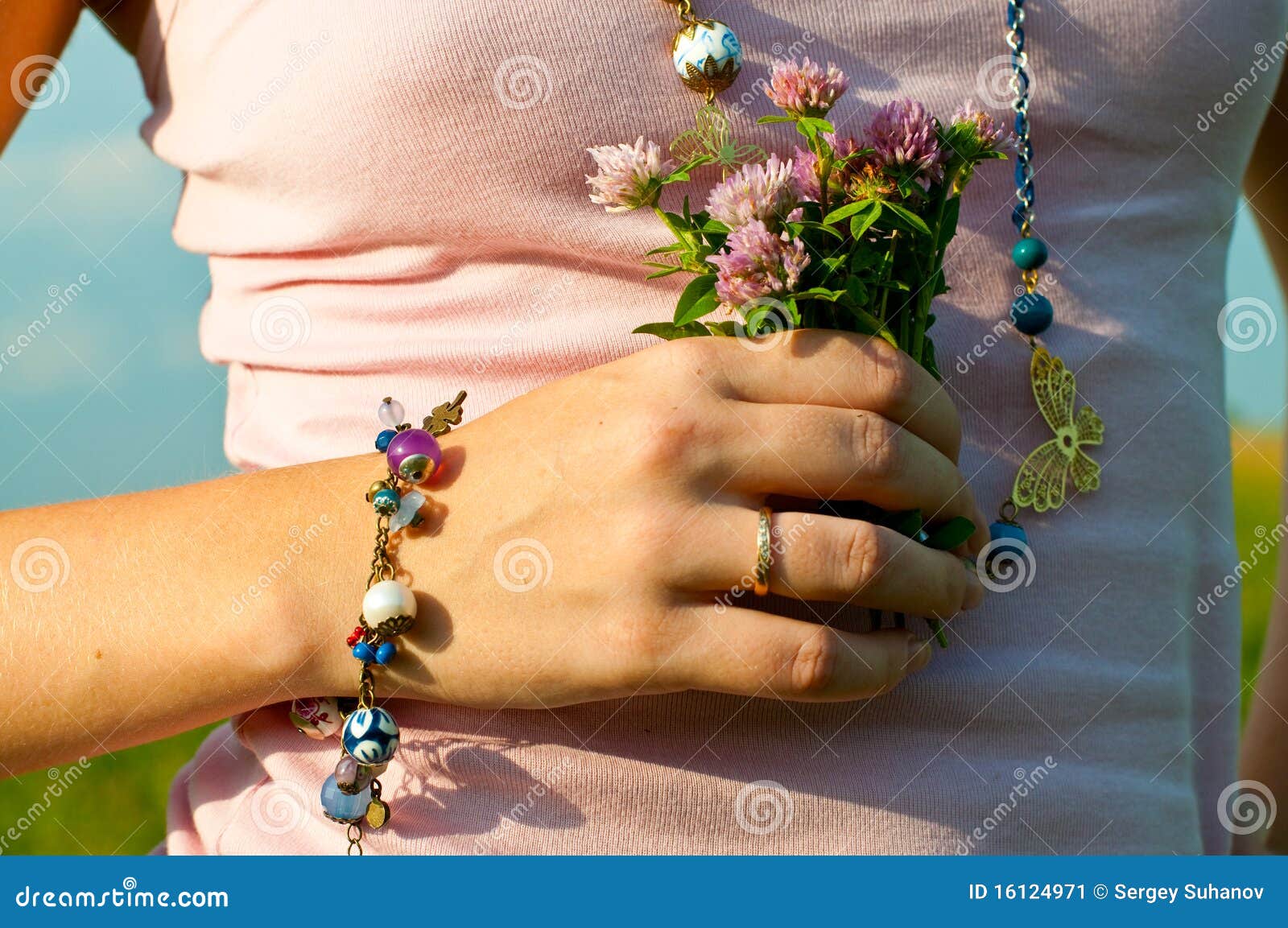 Hand with bunch of flowers stock image. Image of field - 16124971