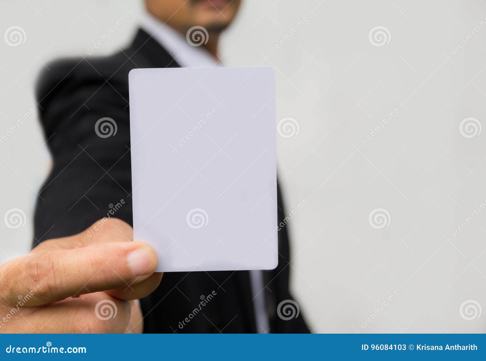 Hand of Businessman Holding the White Card on White. Stock Image ...