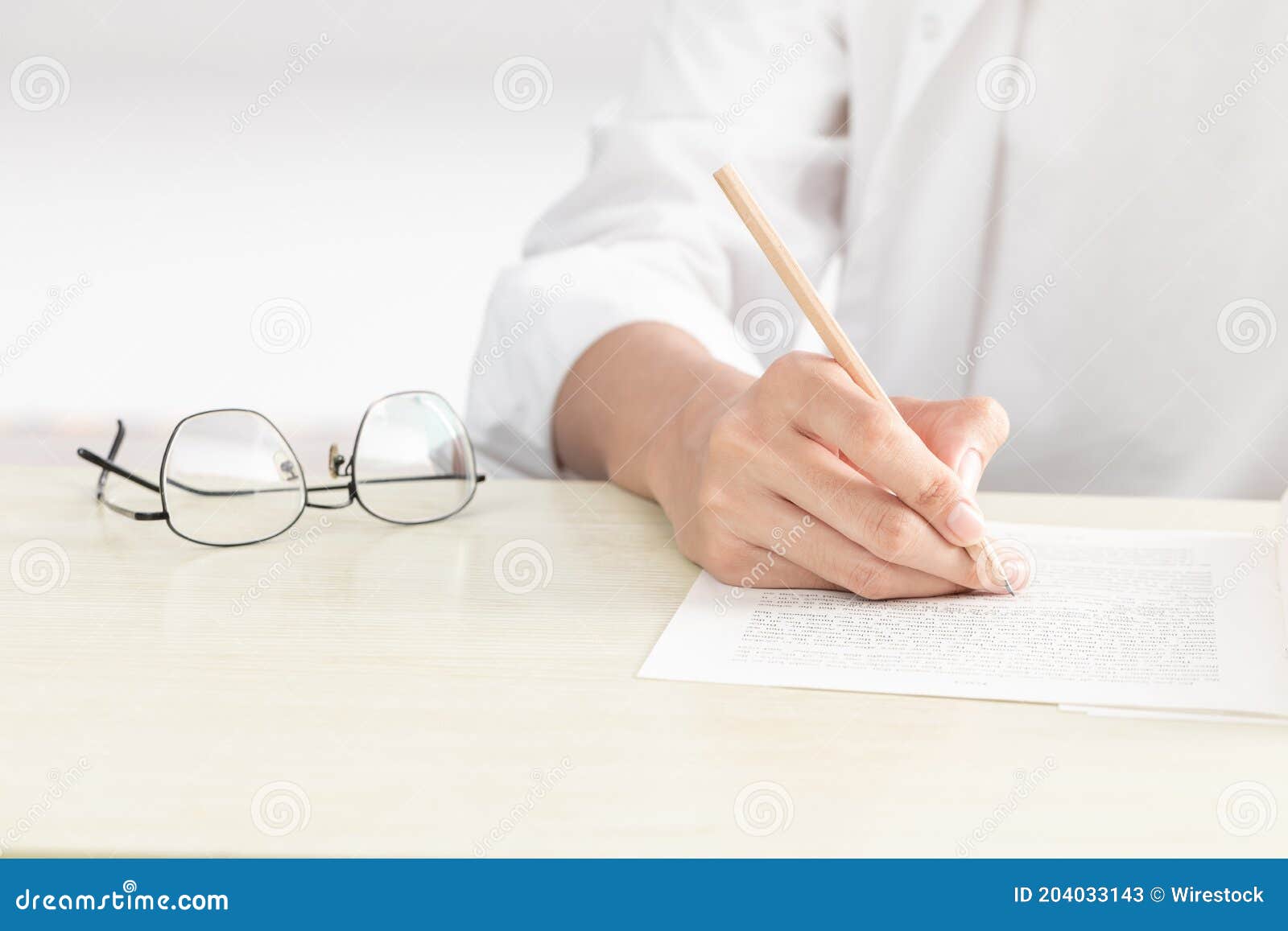 Hand of Businesswoman Writing on Paper in the Office Stock Image ...