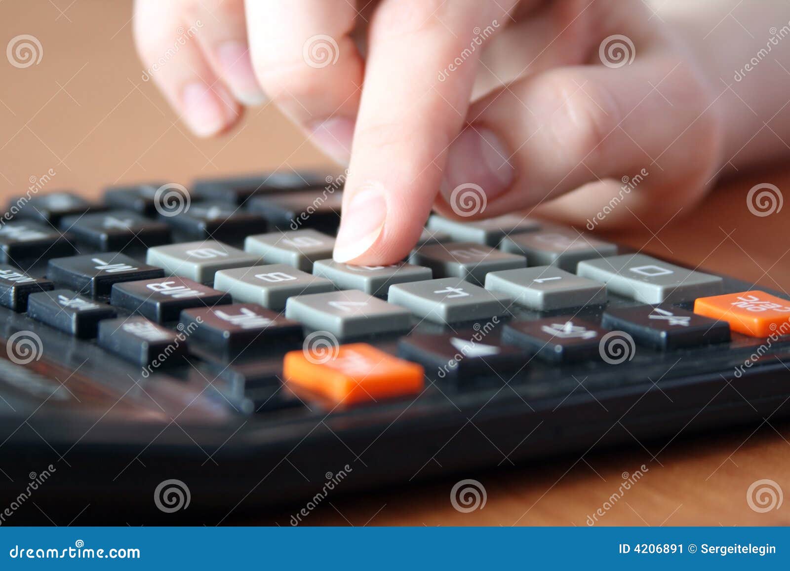 Hand on the calculator stock image. Image of business - 4206891