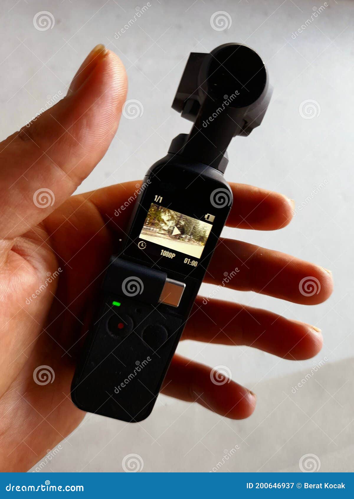 Hand camera image stock image. Image of minicamera, hand - 200646937