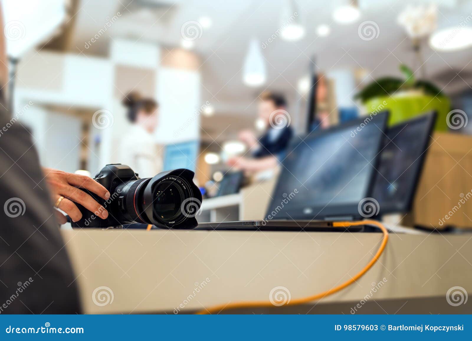 Hand of the Camera Operator Touching a Modern DSLR Stock Image - Image ...