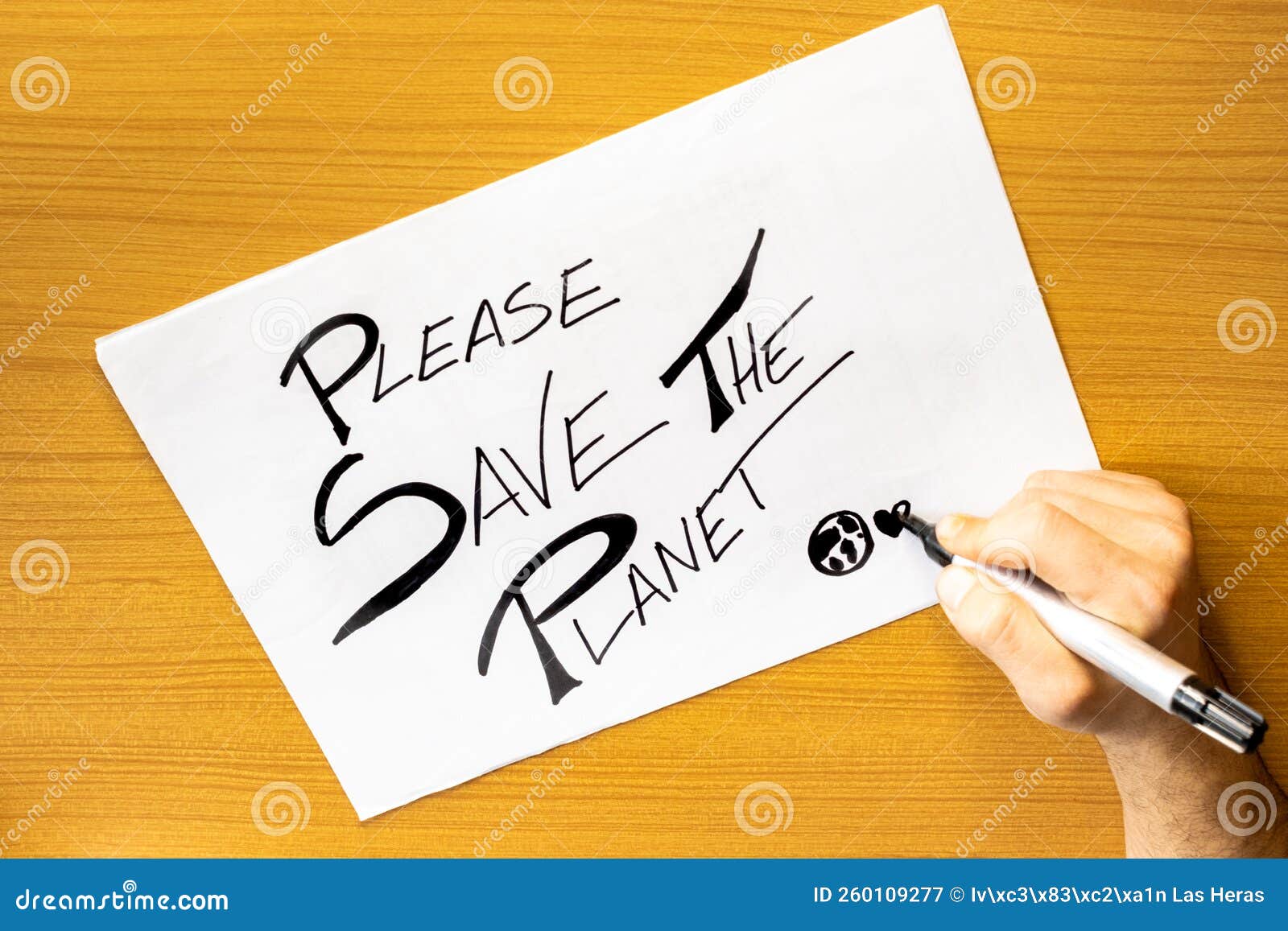 Hand with Card on Table SAVE the PLANET, Message on Cardboard Stock ...