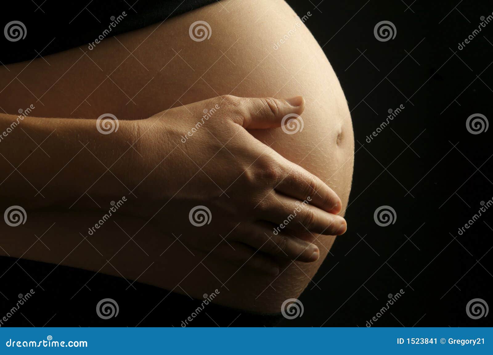 Hand Caressing Pregnant Belly Stock Image - Image of emotion, pregnant ...