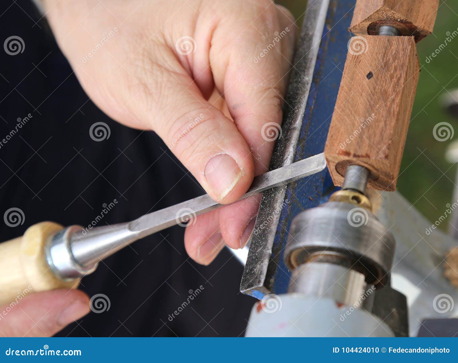 Carpenter while Using the Lathe and the Chisel on the Piece of W Stock ...