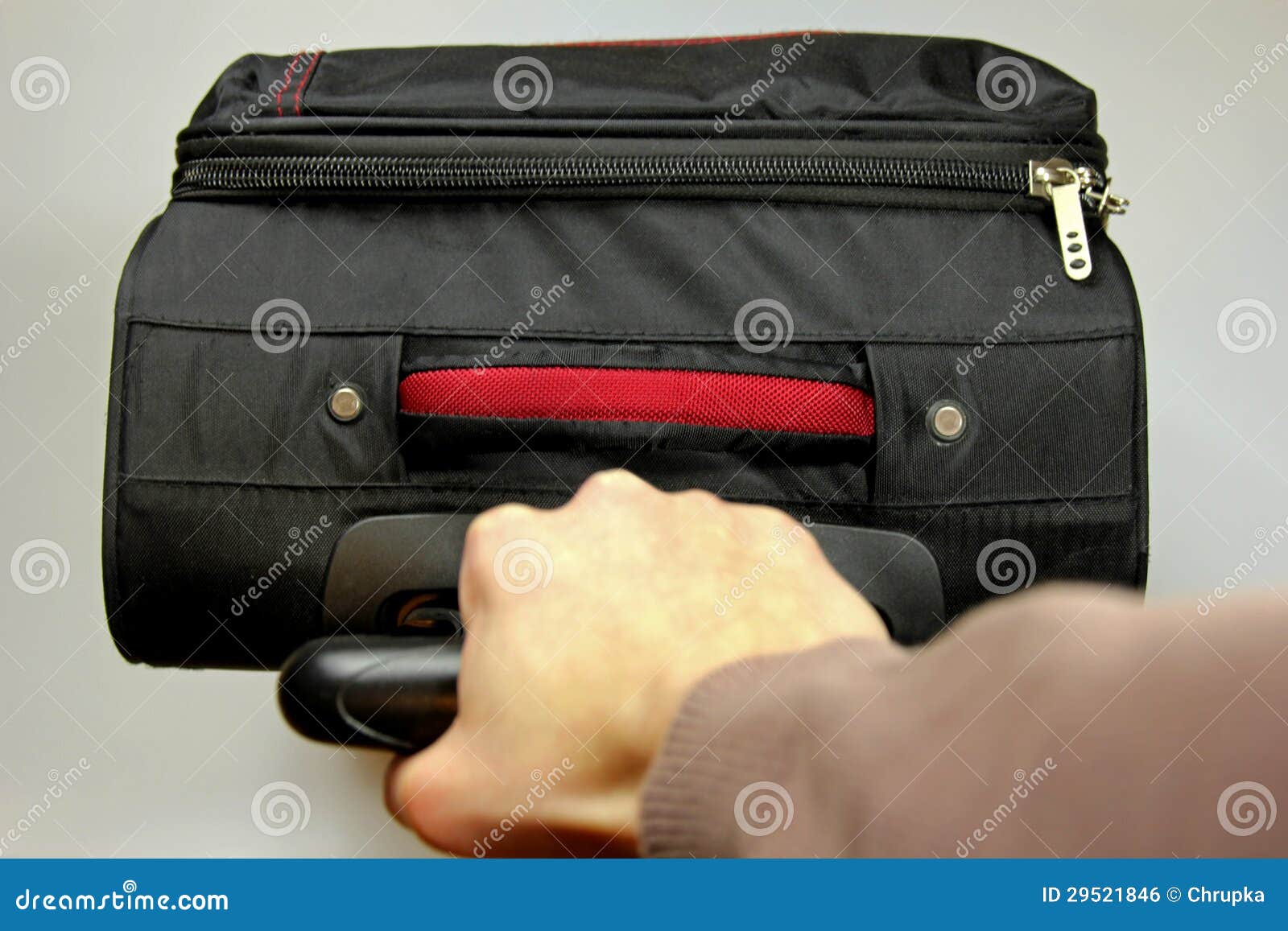 Hand carrying suitcase stock photo. Image of departure - 29521846
