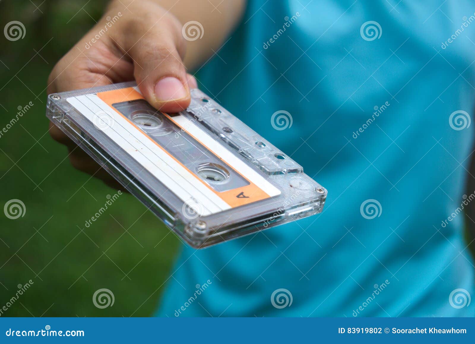 The Hand is Caught the Cassette Tape. Stock Photo - Image of music ...