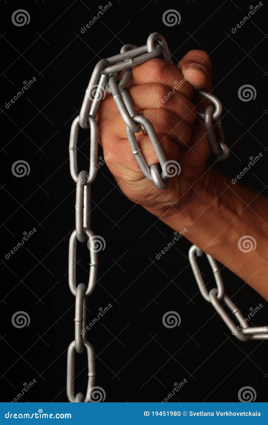Hand and a chain. stock photo. Image of power, linked - 19451980