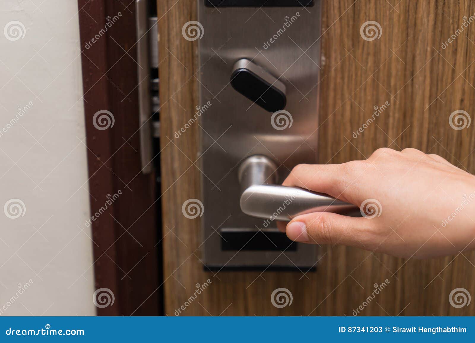 Hand check the door, lock stock image. Image of home - 87341203