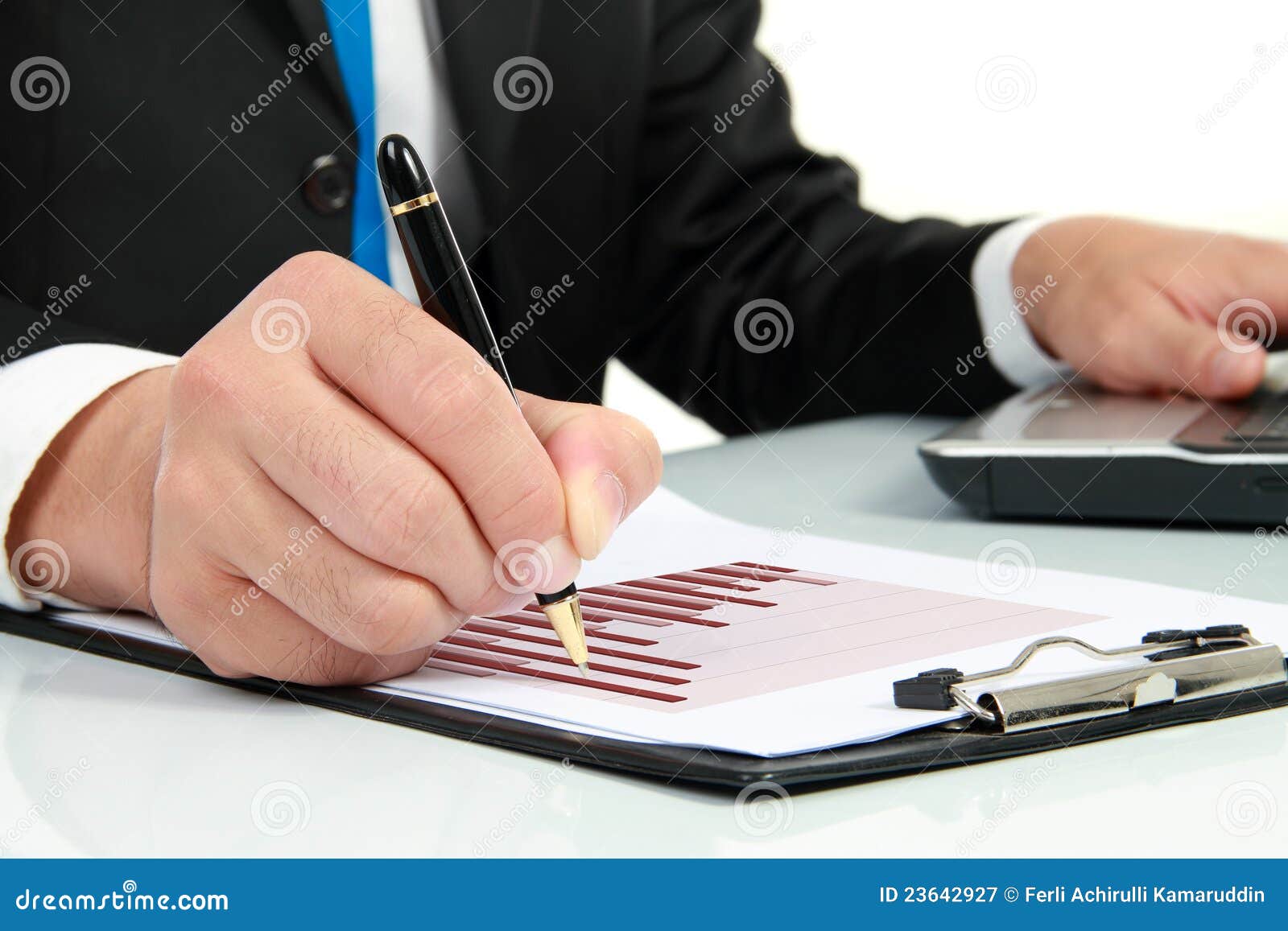 Hand Checking at Diagram on Financial Report Stock Image - Image of ...