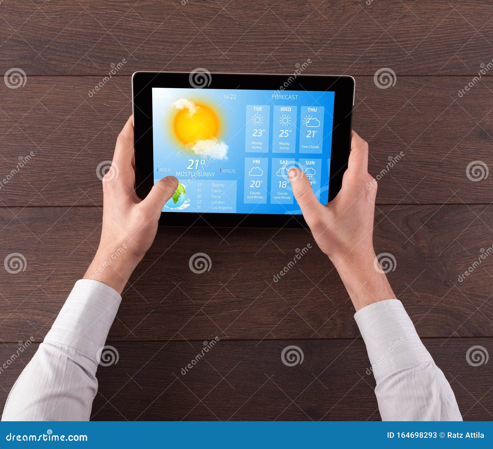 Hand Checking Weather on Tablet Stock Image - Image of break, desk ...