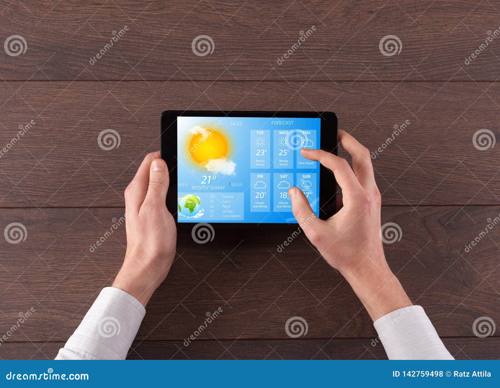 Hand Checking Weather on Tablet Stock Photo - Image of clock, desk ...