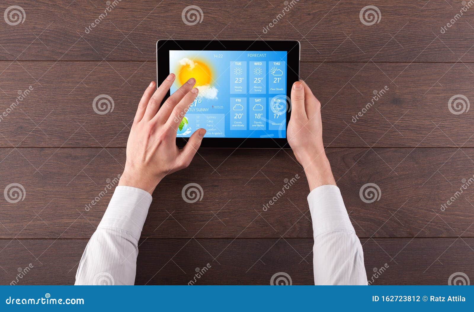 Hand Checking Weather on Tablet Stock Photo - Image of desk, hand ...