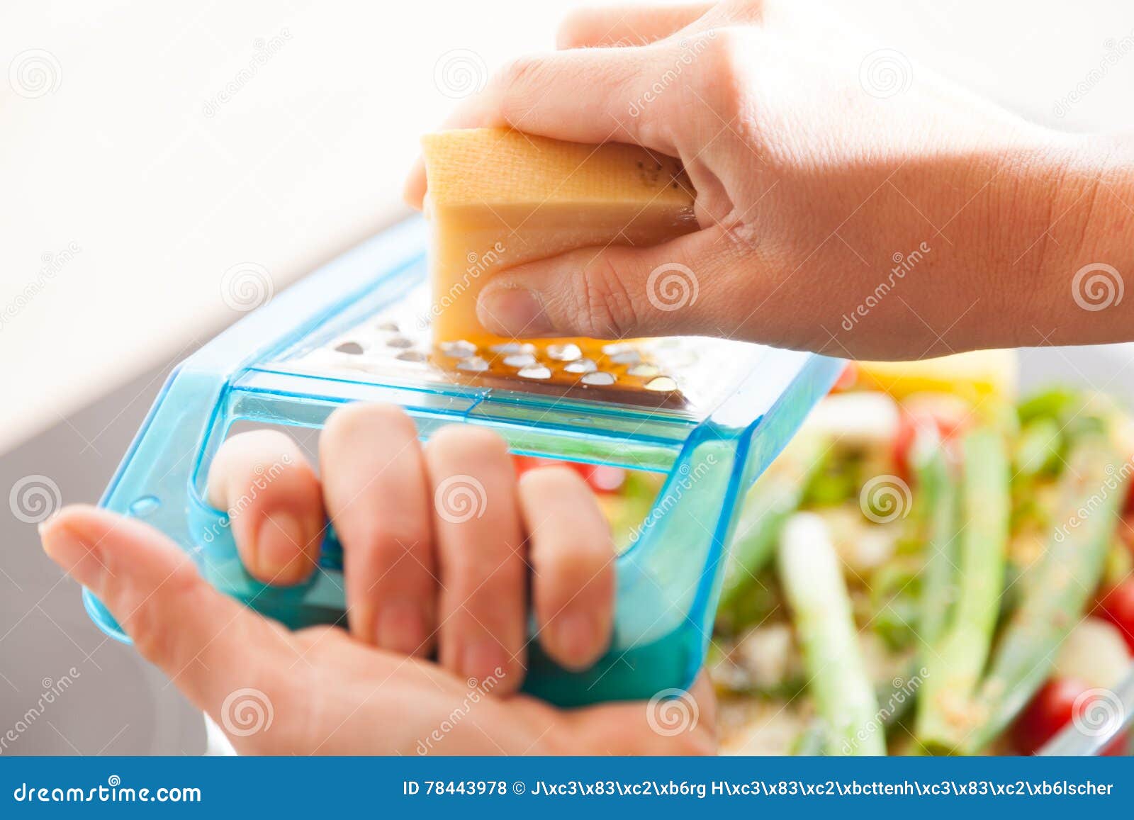 Hand on a cheese grater stock photo. Image of piece, meal - 78443978