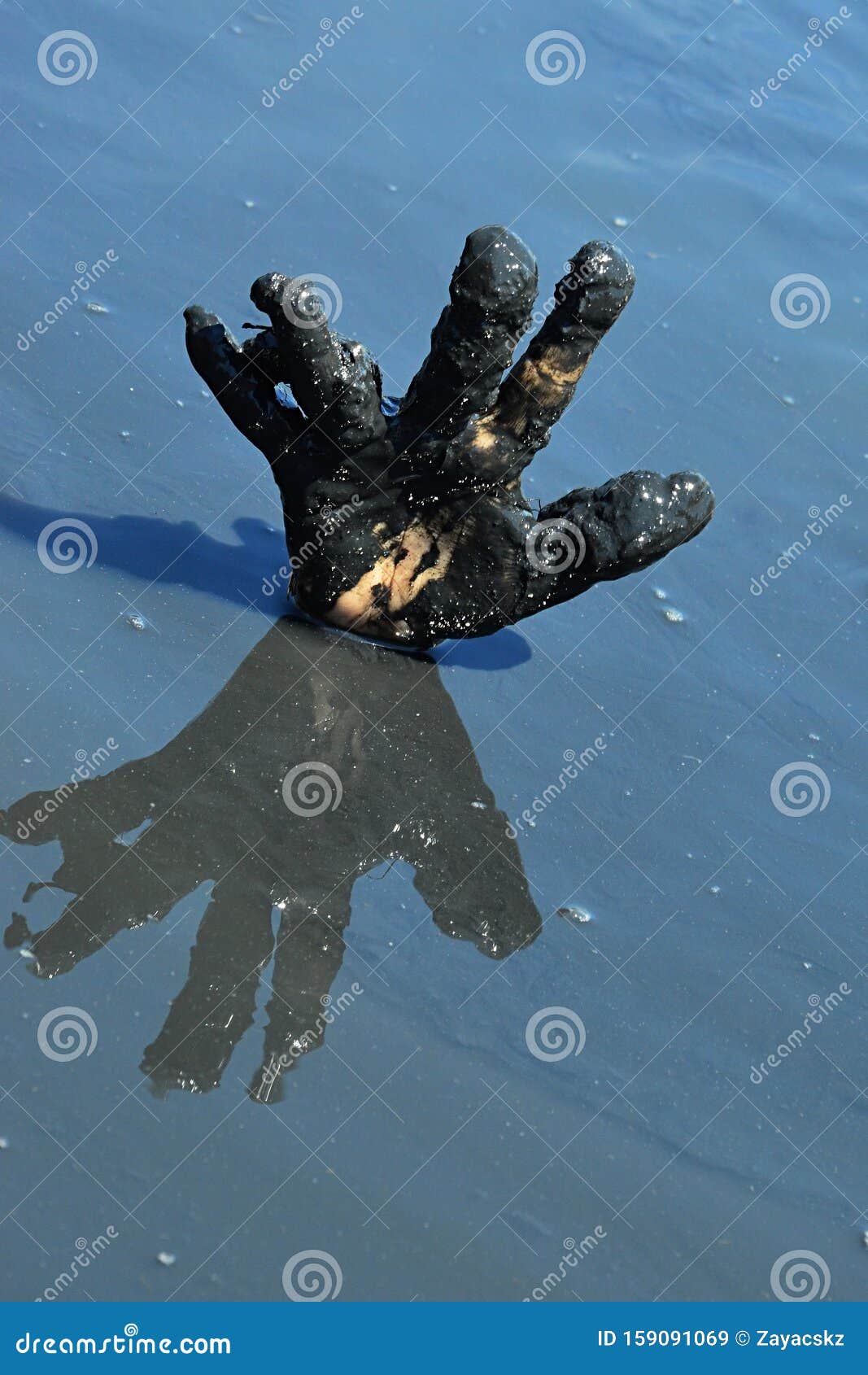Hand Of Child Covered With Healing Mud, Slowly Sinking In Muddy Water ...