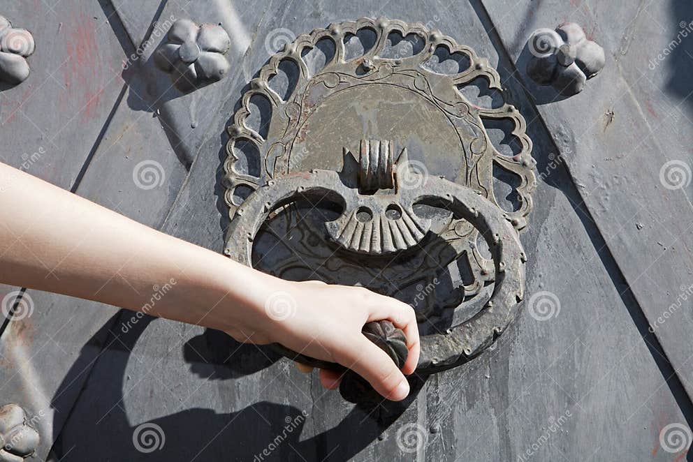 Hand of child and knocker stock image. Image of metal - 20935631