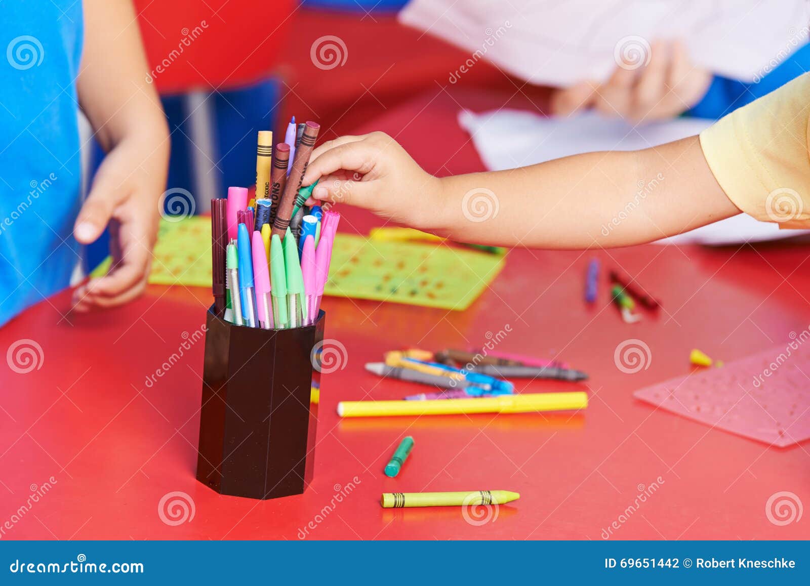 Hand of Child Reaching for a Crayon Stock Photo - Image of care, paper ...