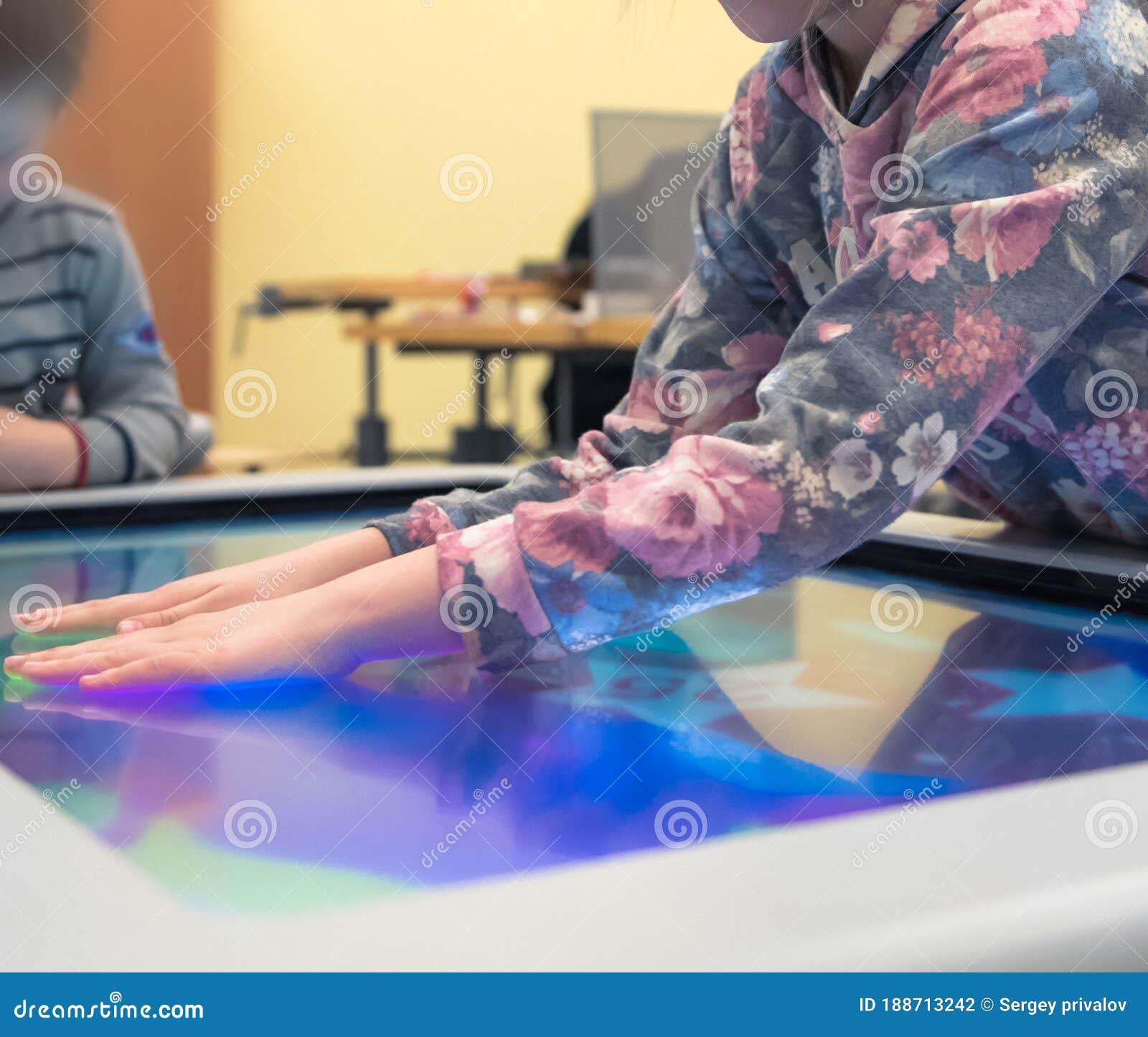 The Hand of the Child Stretches To Press the Touchscreen Stock Photo ...