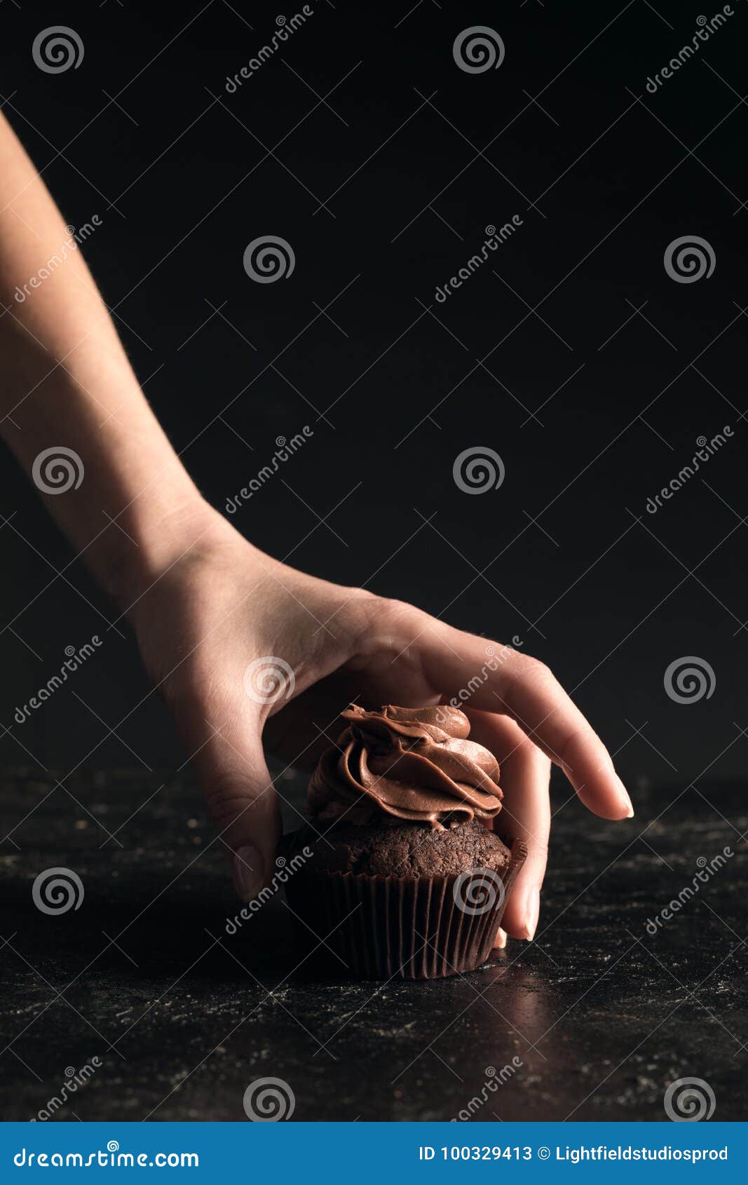 Hand with Chocolate Cupcake Stock Image - Image of cooking, breakfast ...