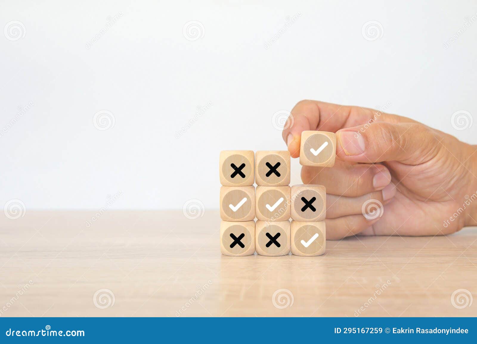 Hand Choose Check Mark with Cross Symbol on Cube Wooden Block Stack for ...