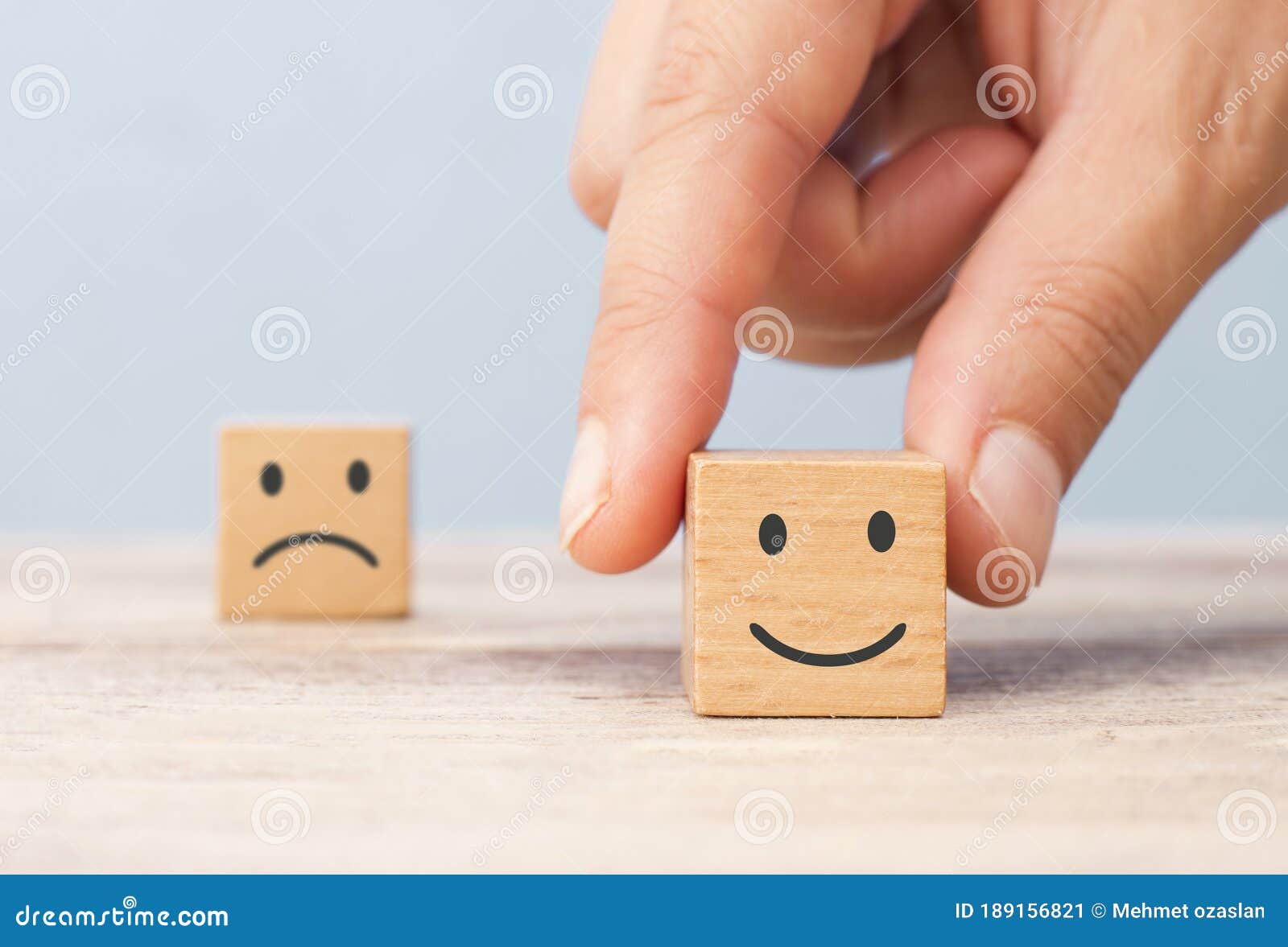 Hand Chose Smiley Face Front of Sad Face.customer Satisfaction Concept ...