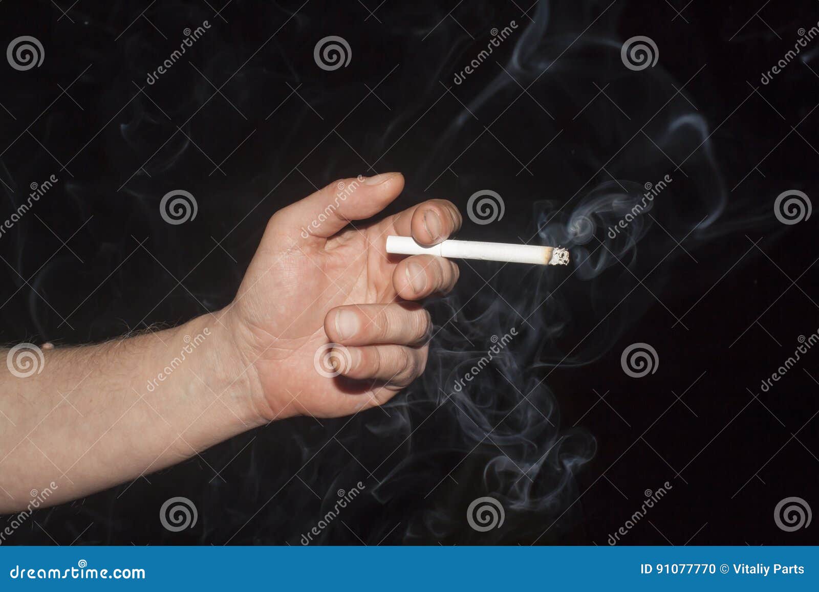 Hand with cigarette stock photo. Image of unhealthy, lifestyle - 91077770