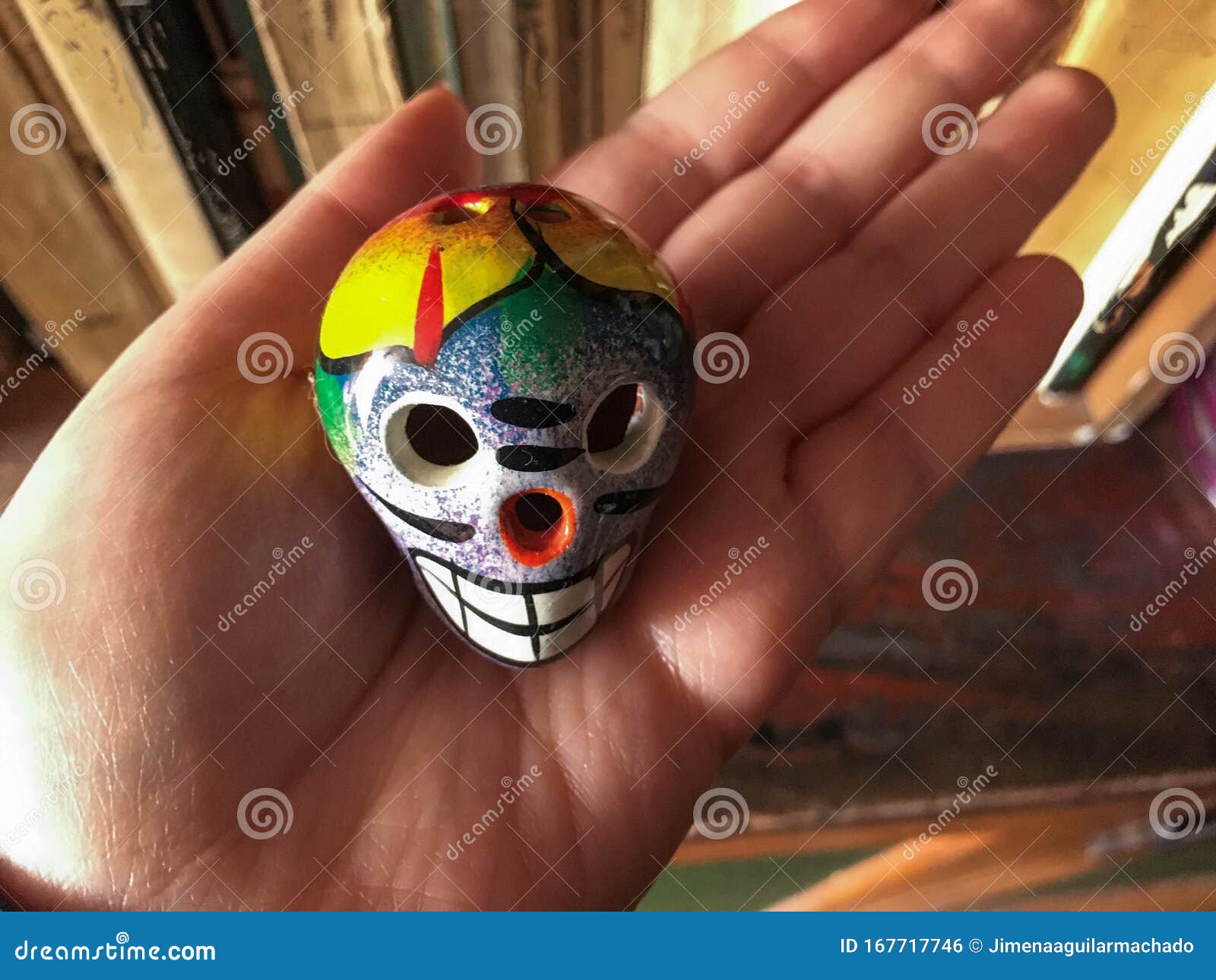 Hand with a clay skull stock photo. Image of dead, mask - 167717746