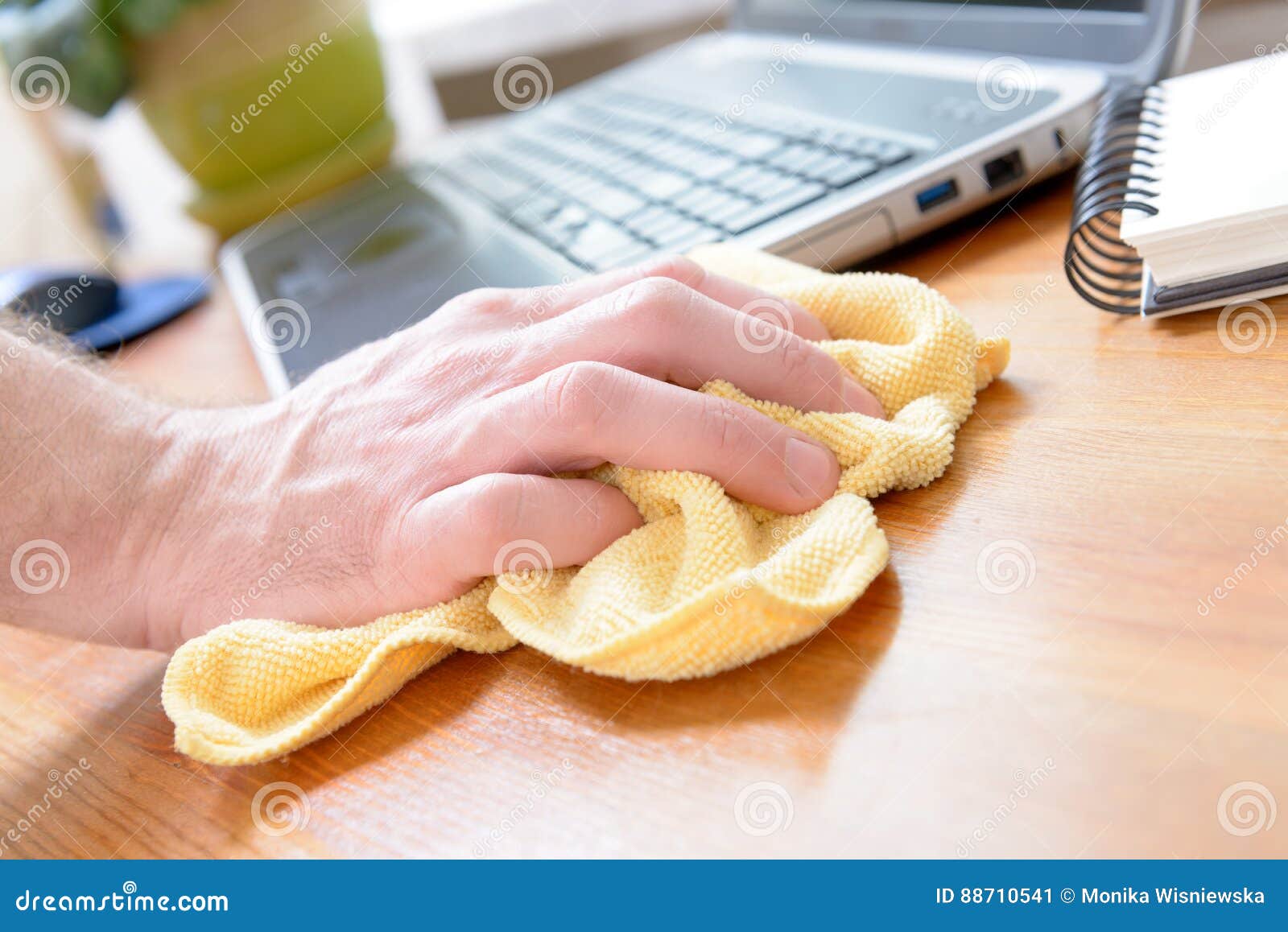 Cleaning Desk Surface In Office With Sanitizer Spray, Wear Gloves And ...