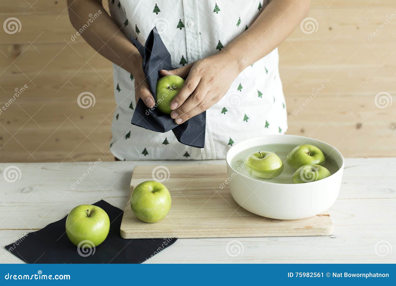 Hand cleaning green apple stock image. Image of ripe - 75982561