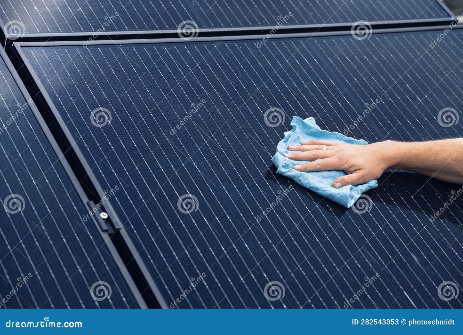 Hand Cleaning a Solar Panel with a Cloth Stock Image - Image of ...