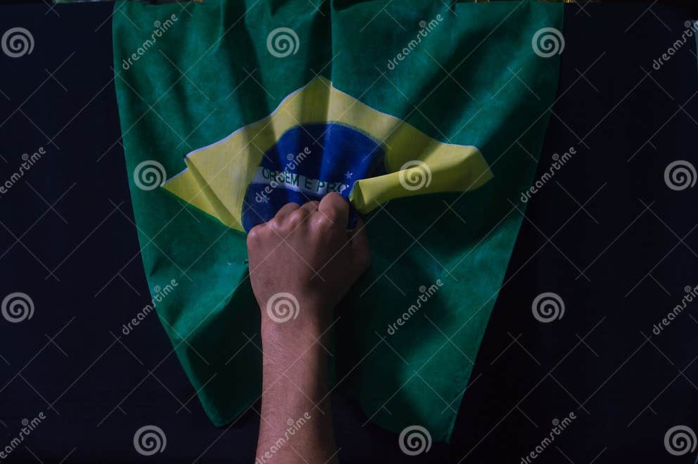 Hand Closed Holding and Pulling Flag Stock Image - Image of freedom ...