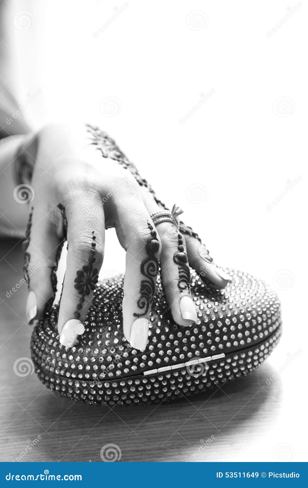 Hand and clutch stock image. Image of branded, henna - 53511649