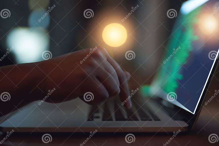 Hand Coding And Hacker On Laptop At Night As Malware Thief For Hacking Database Software