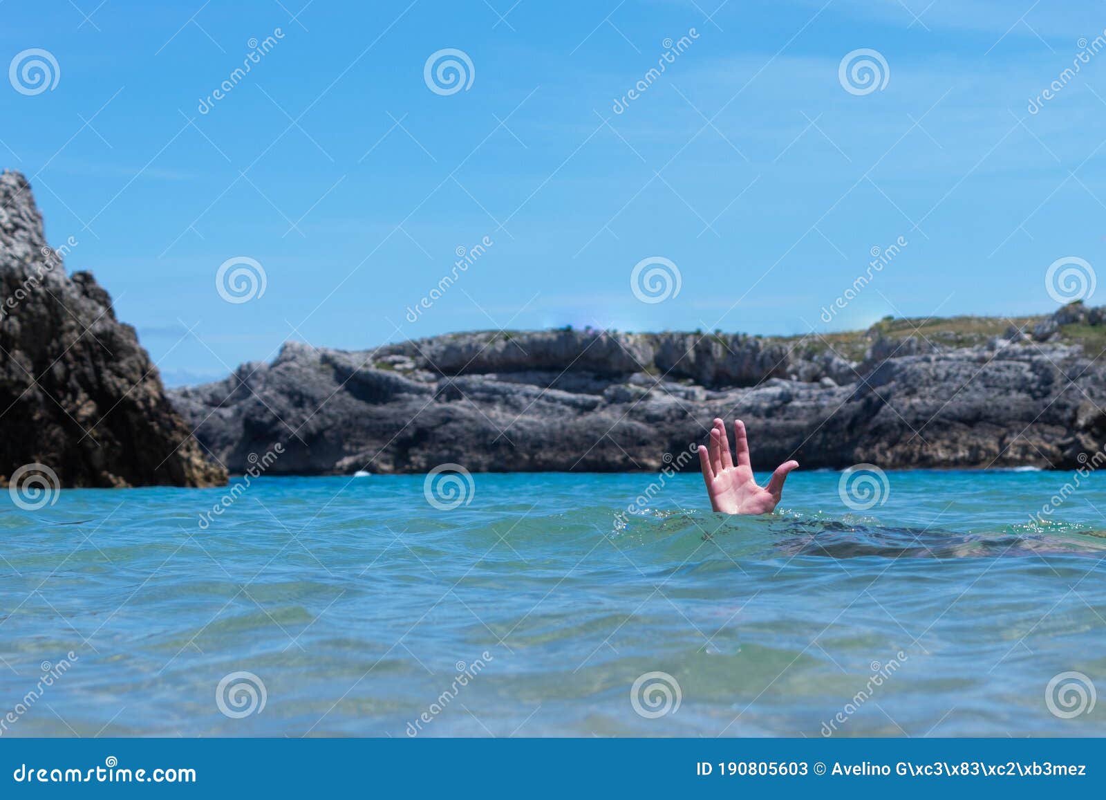 Hand Coming Out of the Water in the Middle of the Ocean Stock Image ...