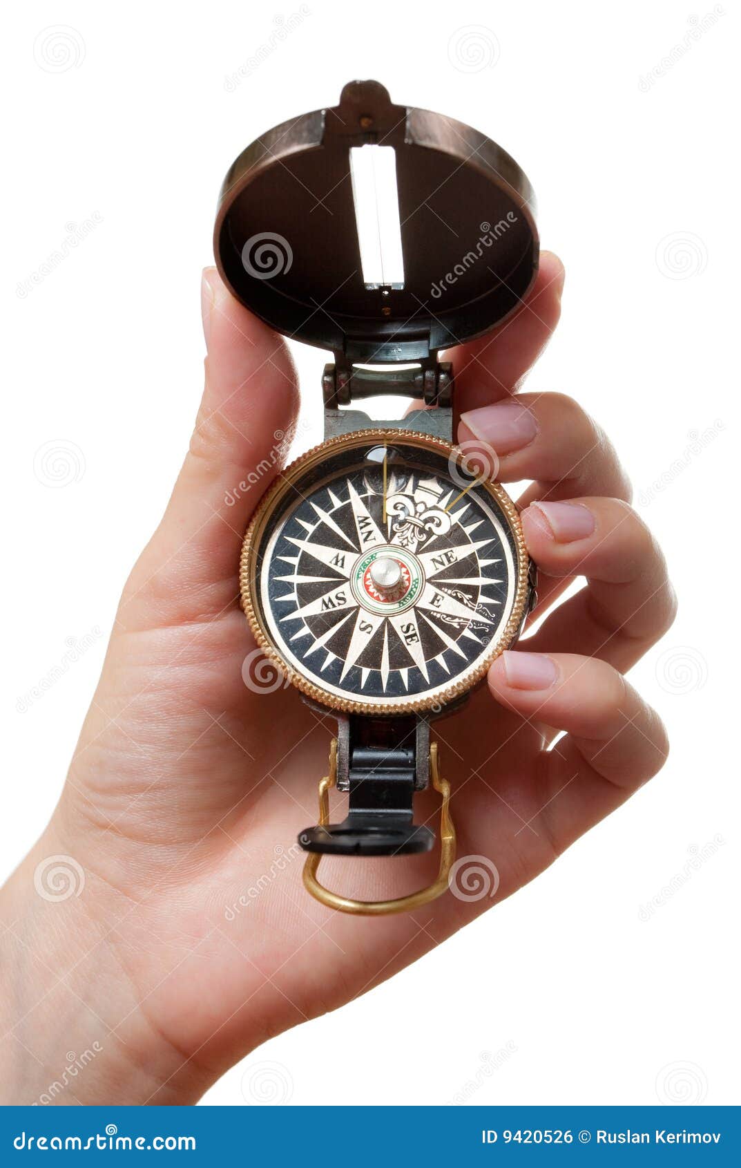 Hand with a compass stock photo. Image of guide, geography - 9420526