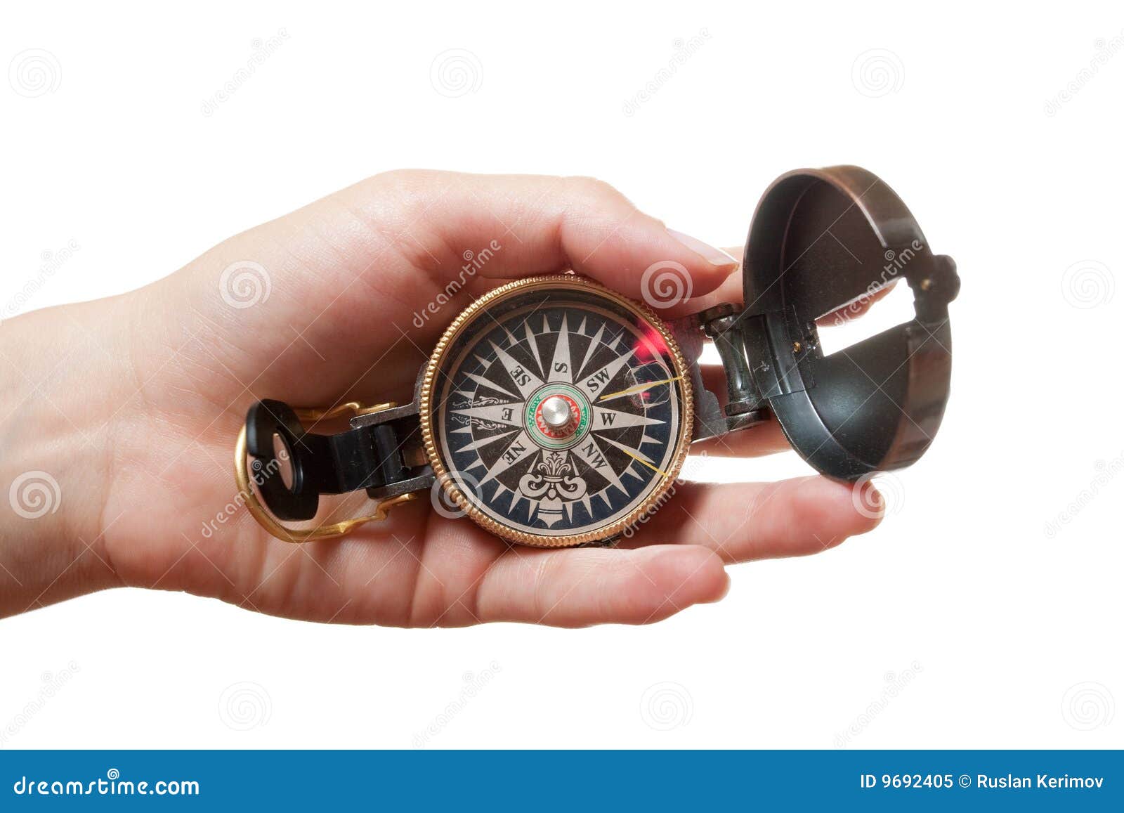 Hand with a compass stock image. Image of orientation - 9692405