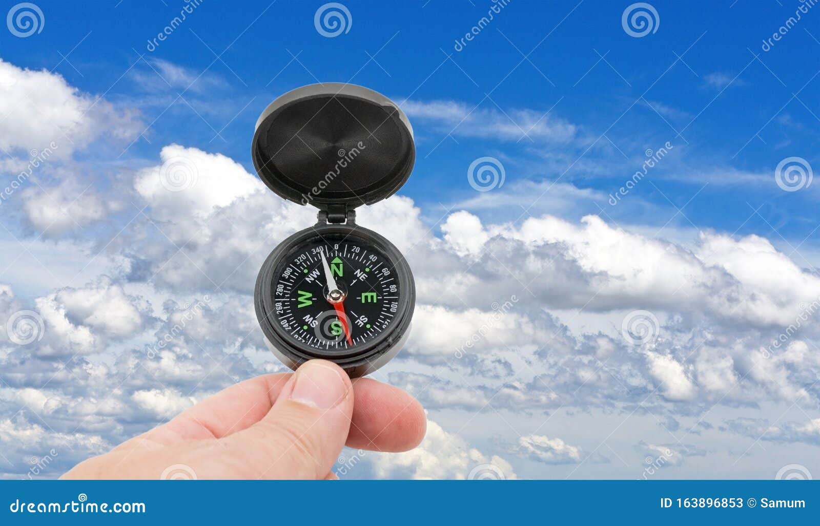 Hand with Compass on Background Blue Sky Stock Image - Image of ...