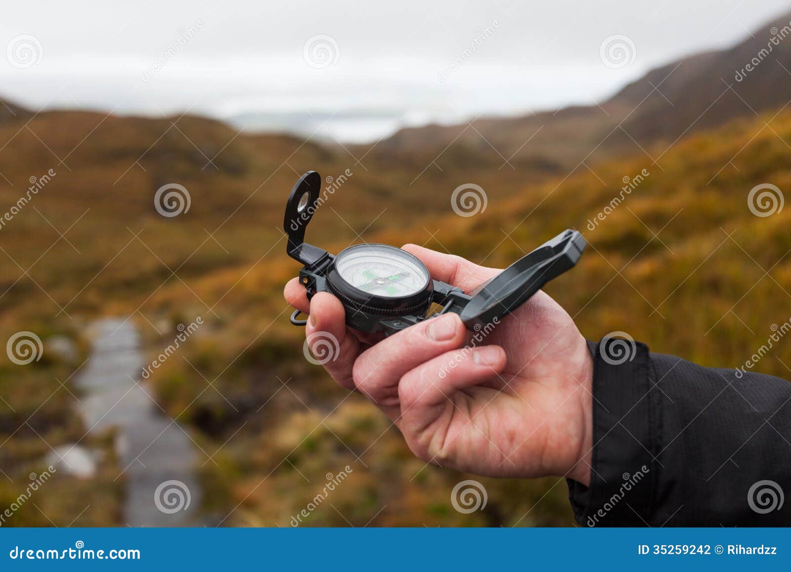 Hand with compass stock photo. Image of leisure, foliage - 35259242
