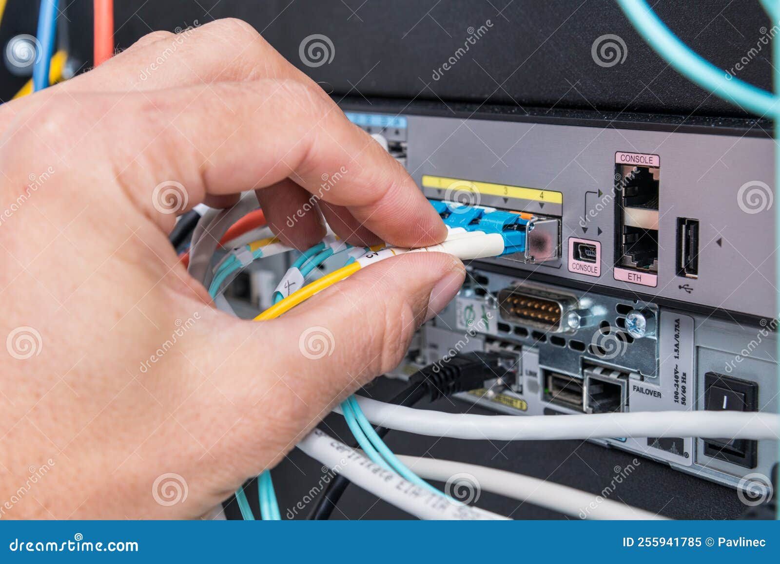 Hand of Computer Engineer Connecting Fiber Optic Cable in Server Stock ...